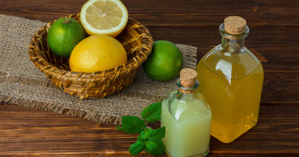 some-lemon-juice-with-half-lemon-piece-sack-basket-wooden-surface-high ...